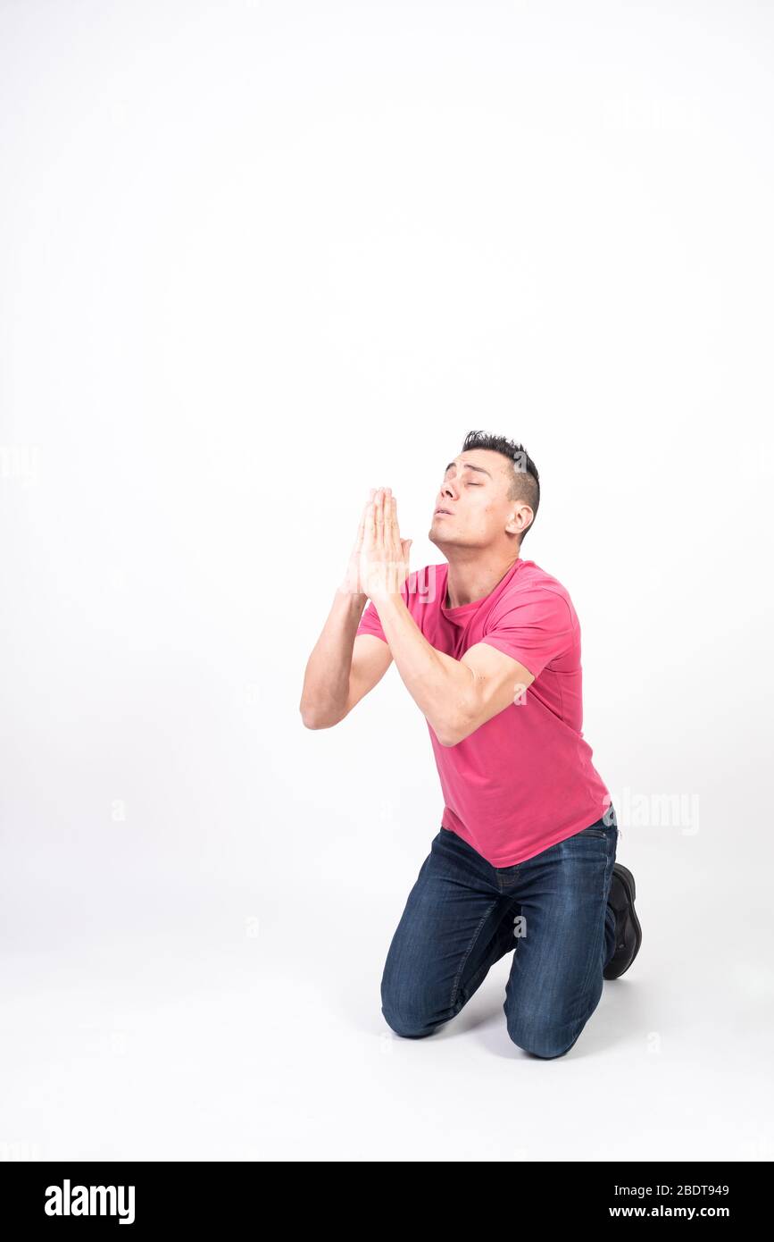 Man praying. White background, full body Stock Photo - Alamy