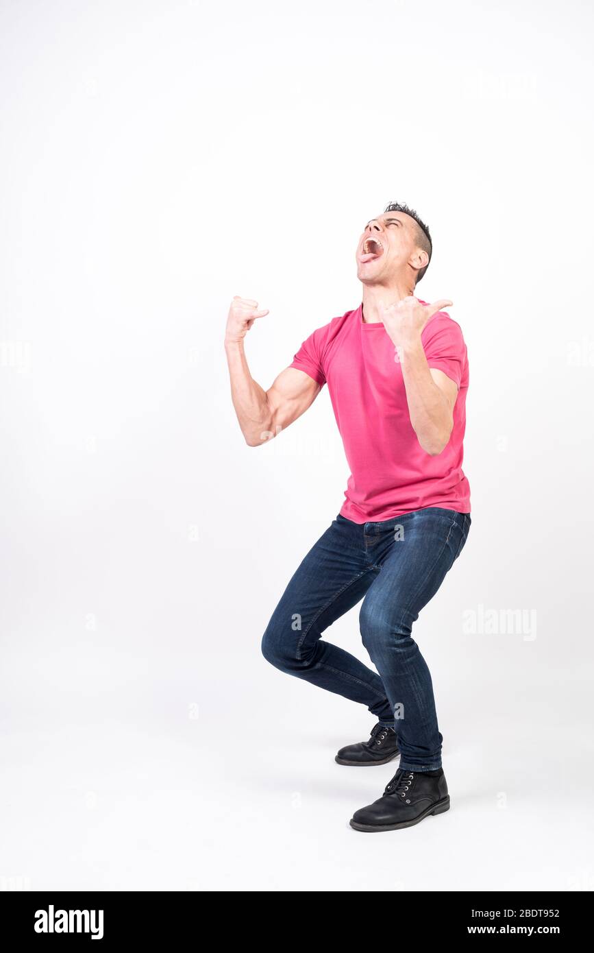 Rocker man. White background, full body Stock Photo - Alamy