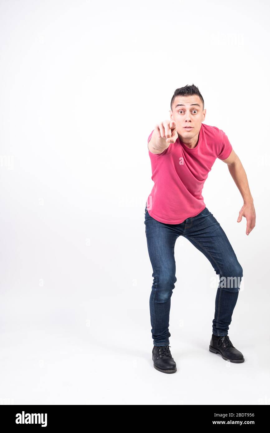 Man pointing in front with index finger. White background, full body ...