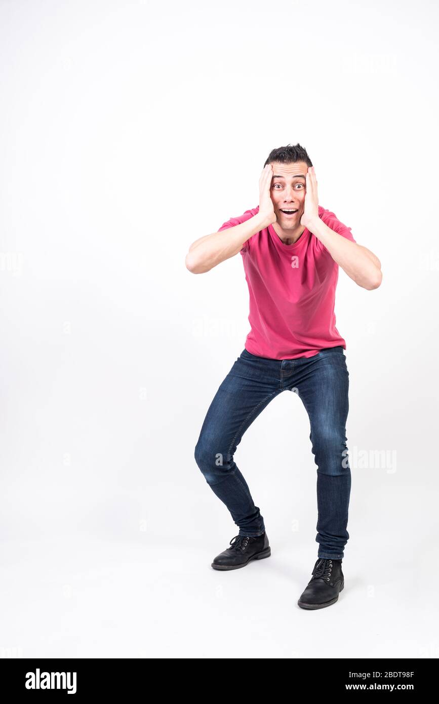 Surprised man. White background, full body Stock Photo - Alamy