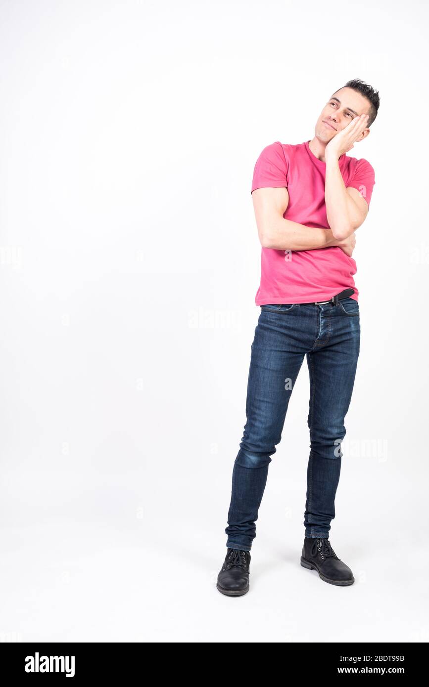 Dreamy man. White background, full body Stock Photo - Alamy
