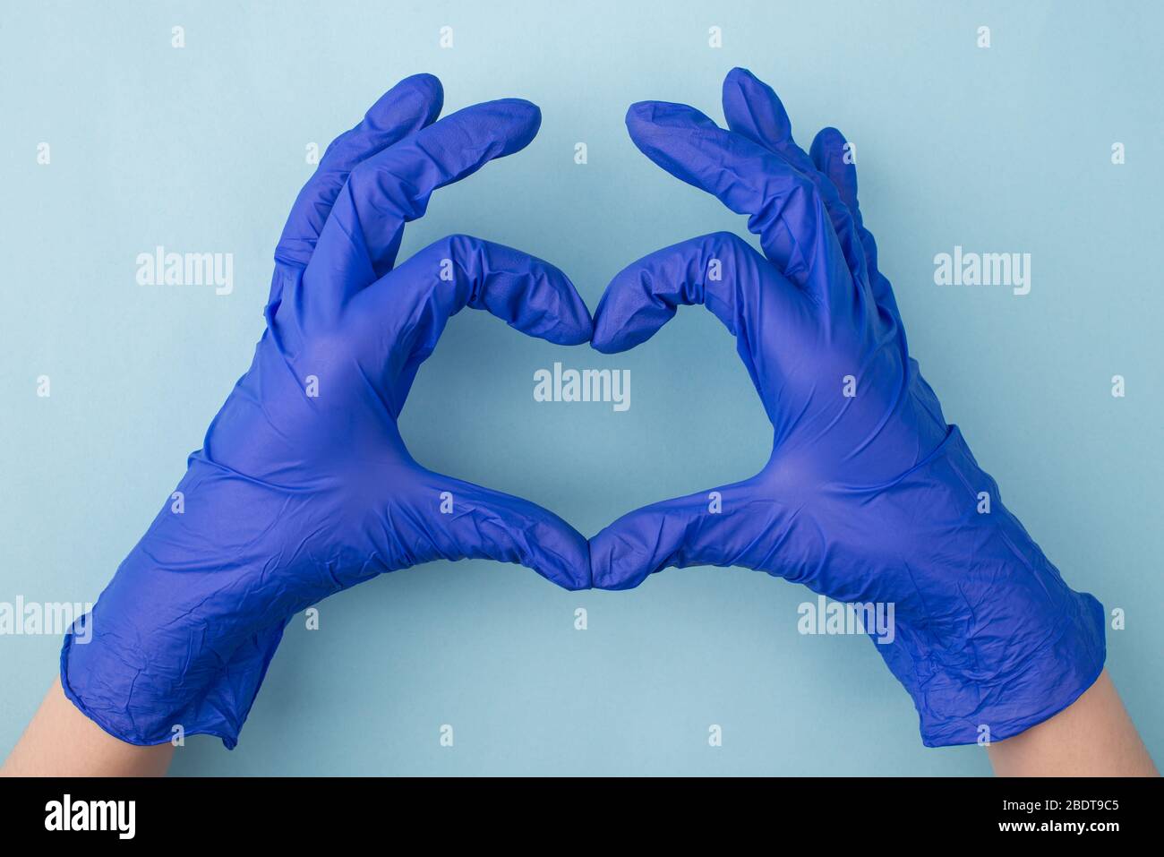 Top overhead above close up view photo of hands showing heart with ...