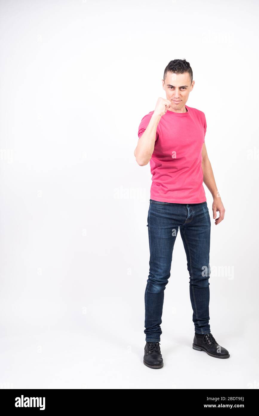 Euphoric man celebrating something. White background. Full body Stock ...