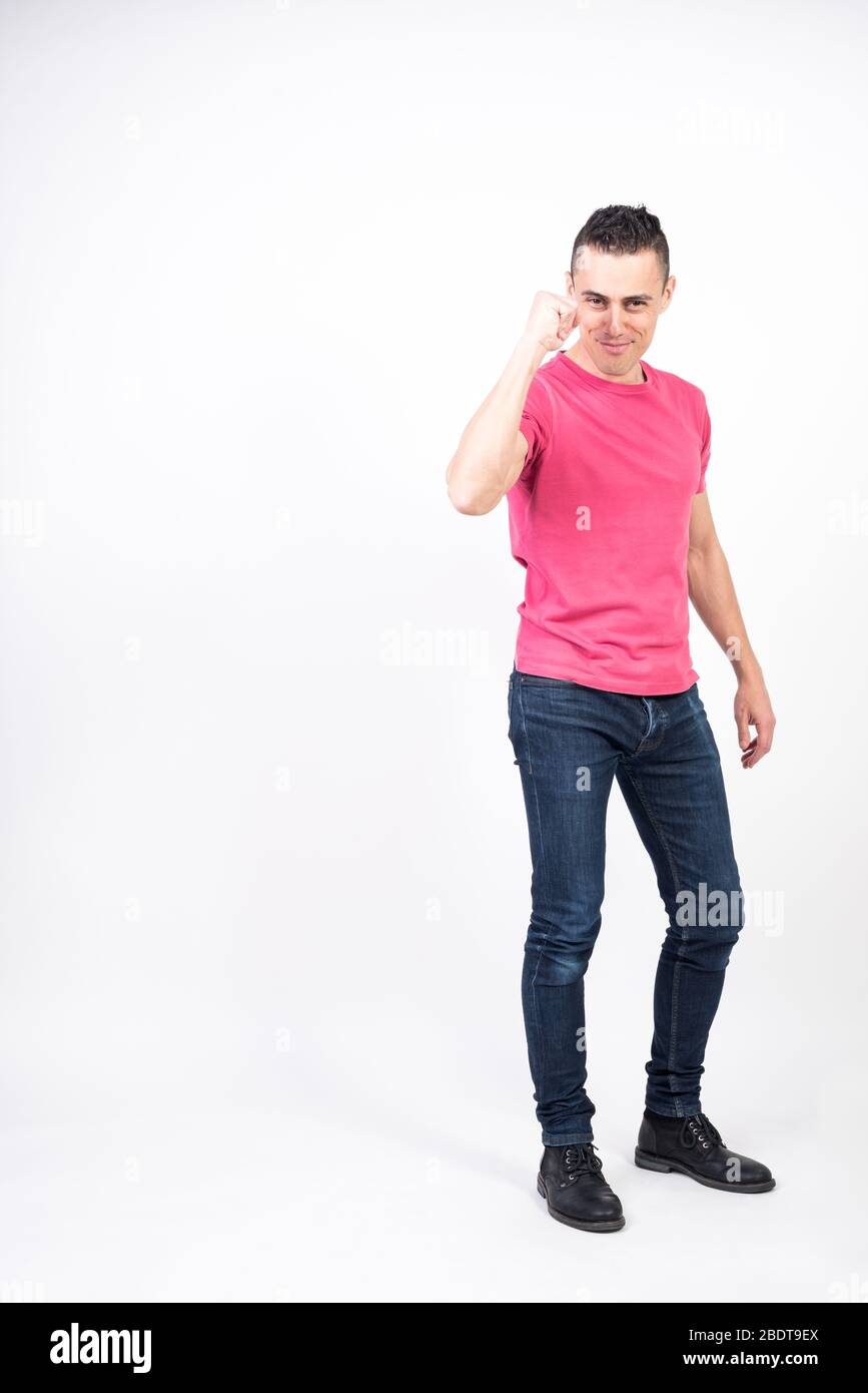 Euphoric man celebrating something. White background. Full body Stock ...