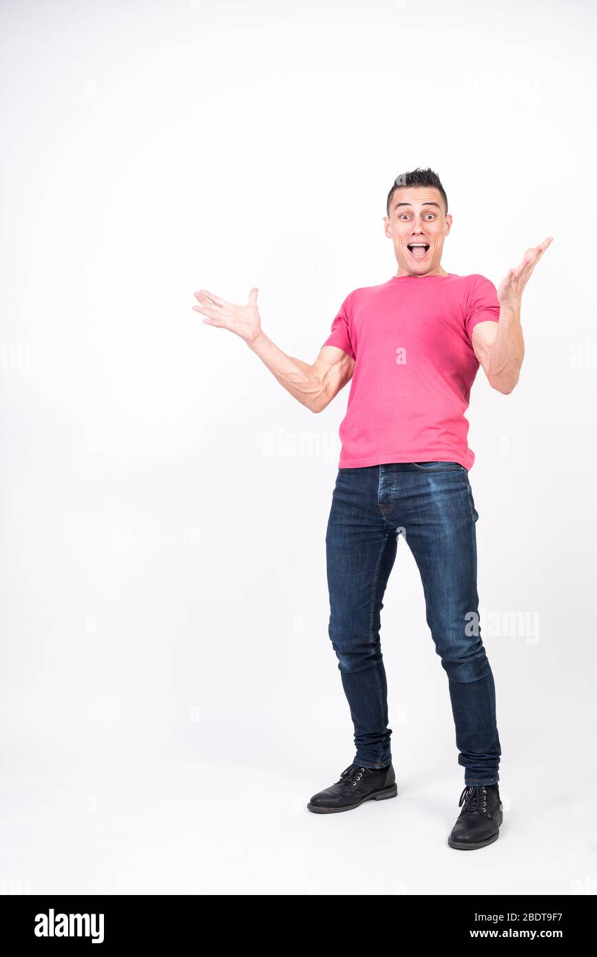 Euphoric man celebrating something. White background. Full body Stock ...