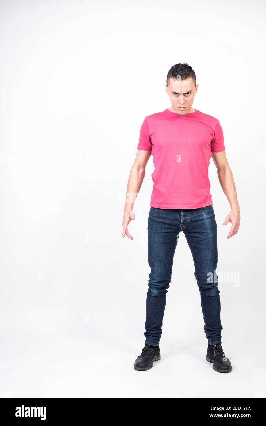 Challenging man. White background. Full body Stock Photo - Alamy