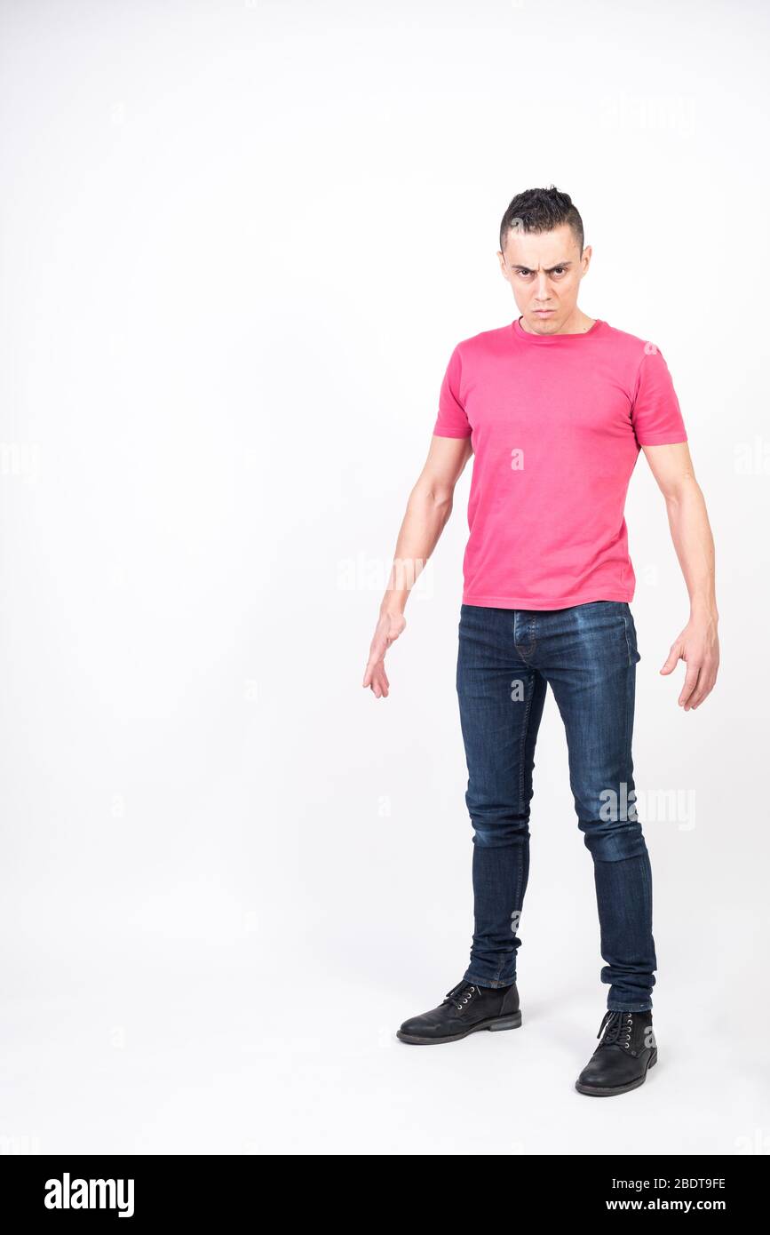 Challenging man. White background. Full body Stock Photo - Alamy