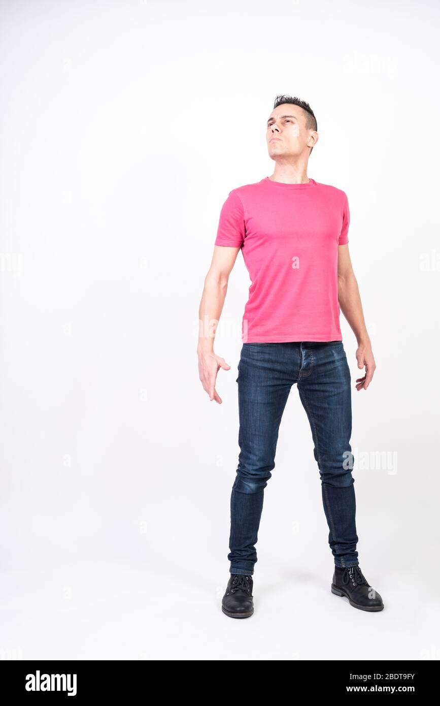 Self-confident man. White background, full body Stock Photo - Alamy