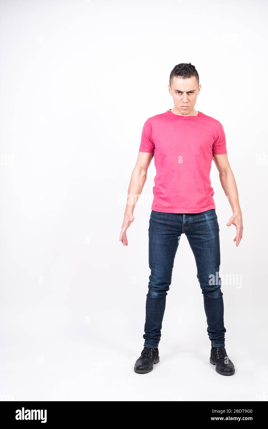 Challenging man. White background. Full body Stock Photo - Alamy