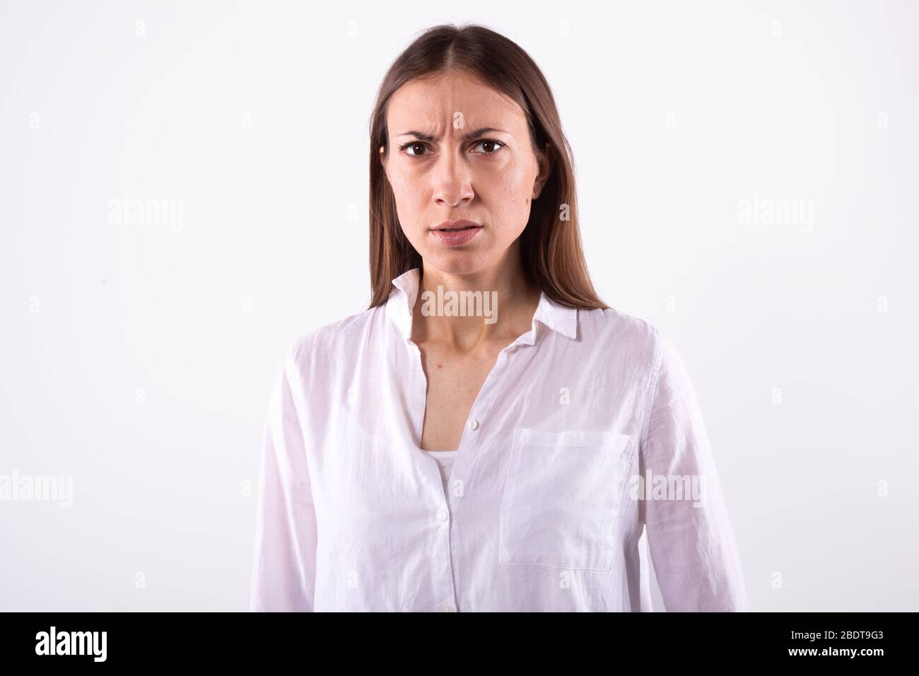 Young caucasian girl looking incredulously. Isolated, white background ...