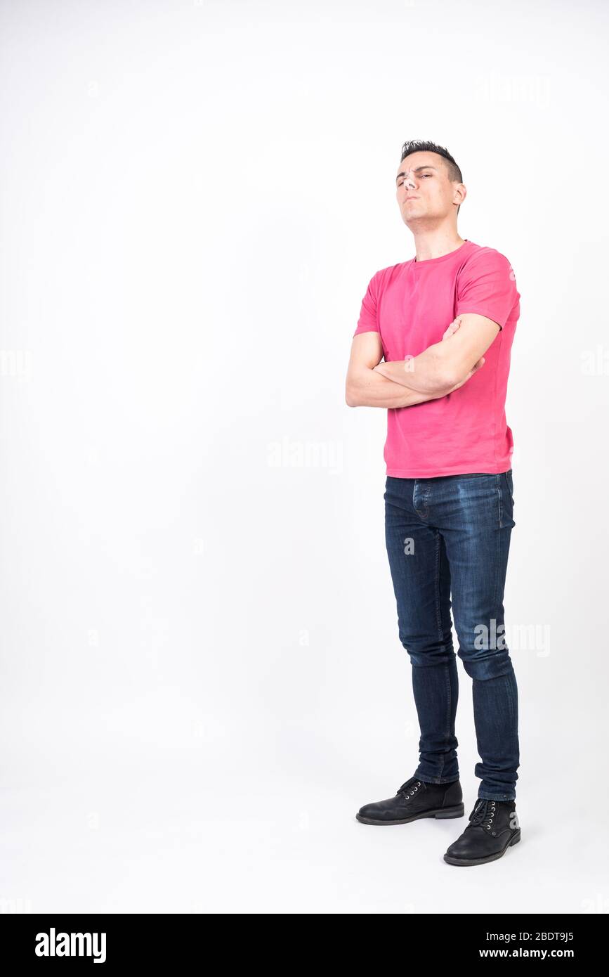 Distrustful man White background. Full body Stock Photo - Alamy