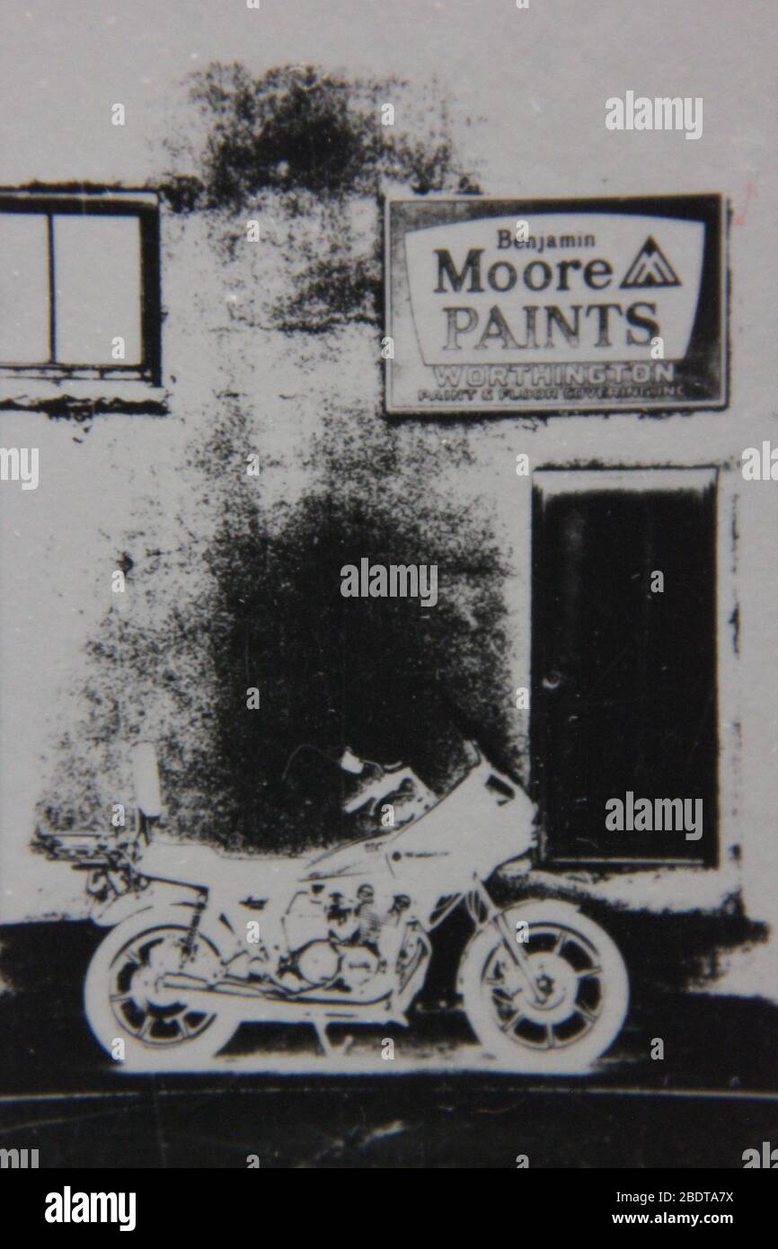 Fine 1970s extreme black and white photography of a motorcycle parked ...