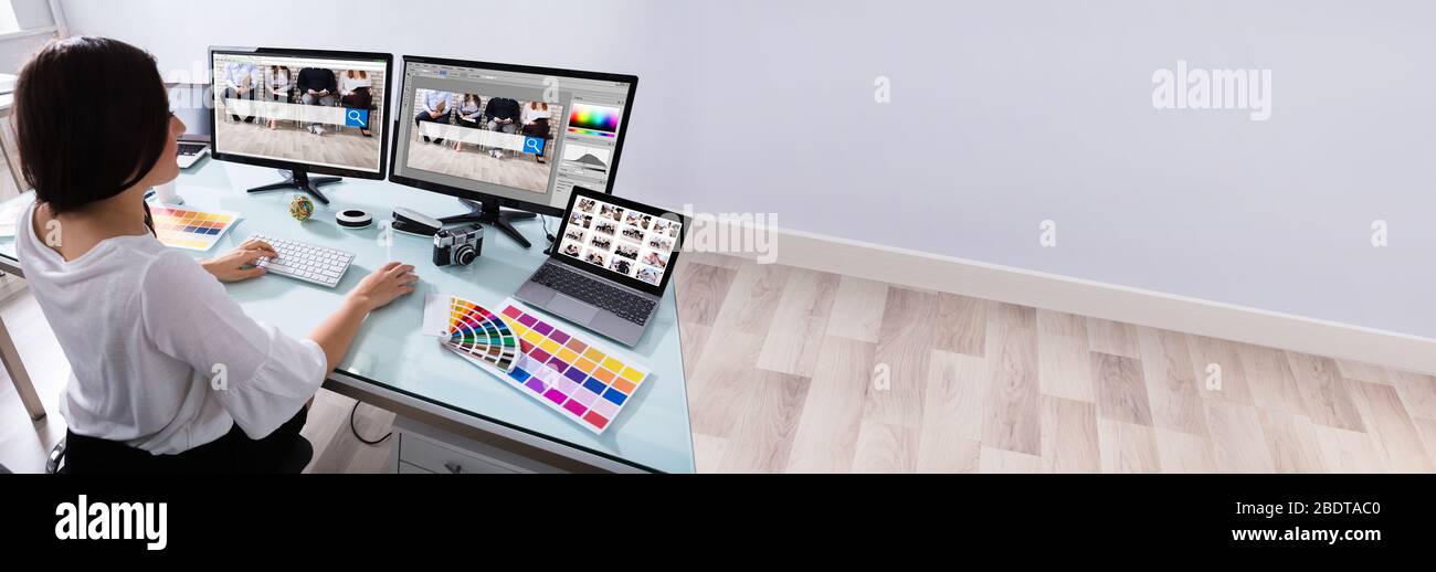 Graphic Designer Artist Working On Multiple Computer Screens Stock ...