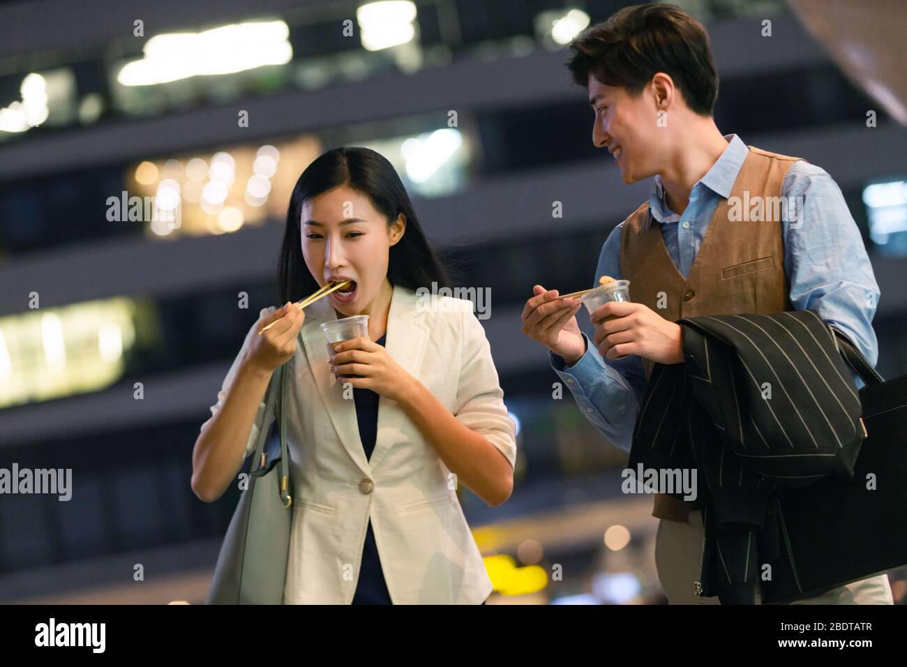 Business people eating in the open air Stock Photo - Alamy