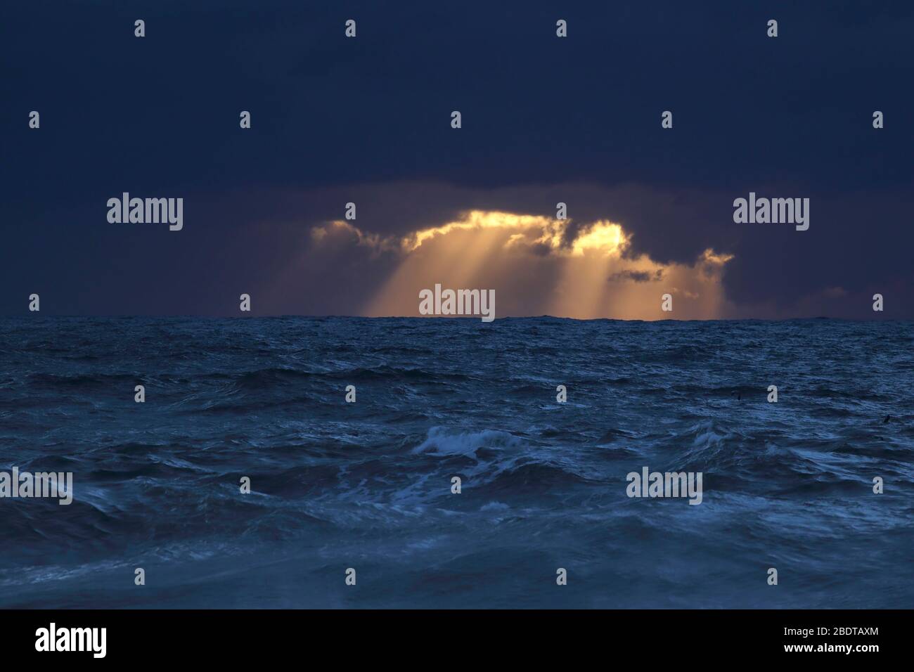 Orange sunbeams hi-res stock photography and images - Alamy