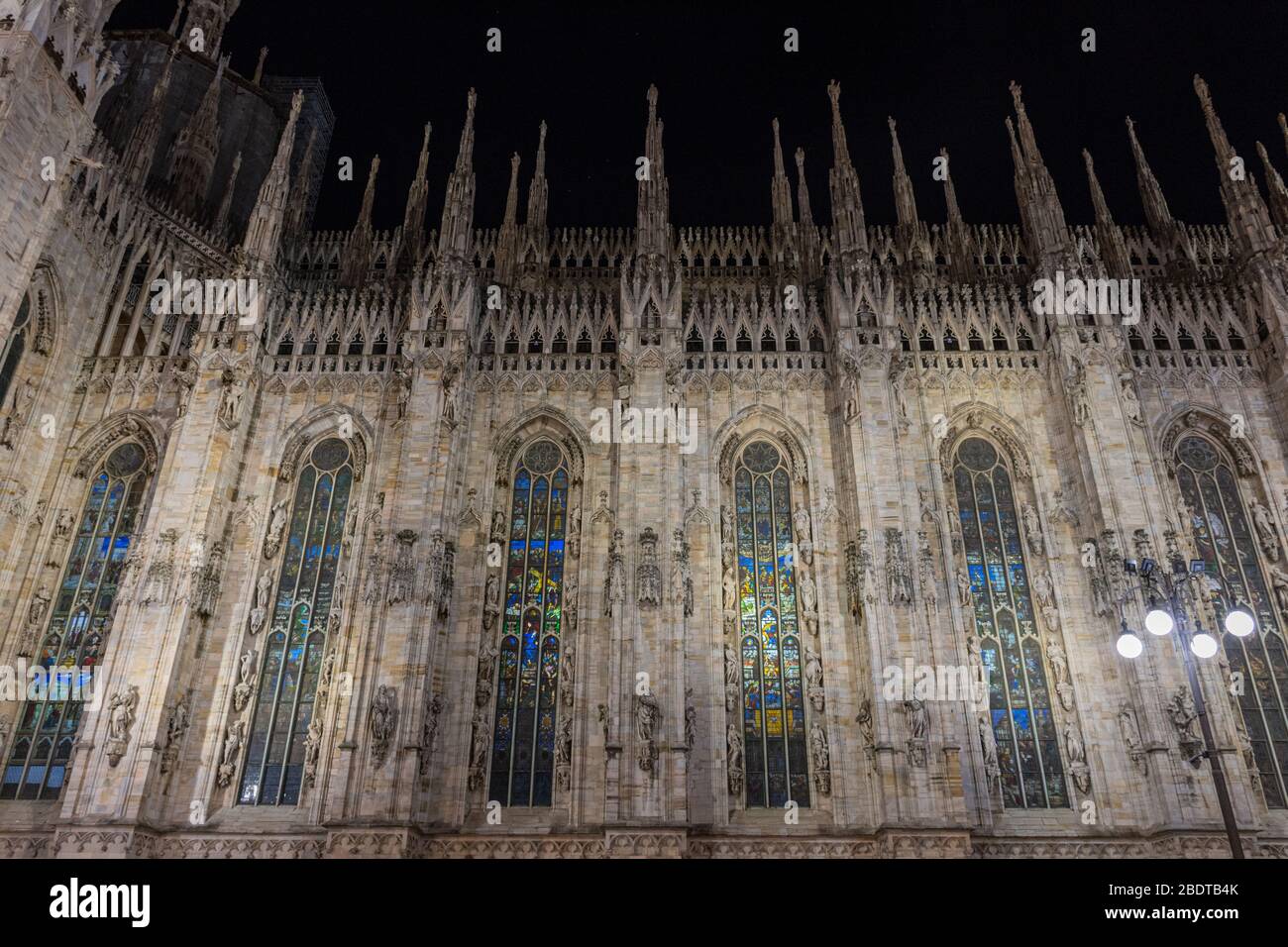 Side door milan cathedral hi-res stock photography and images - Alamy