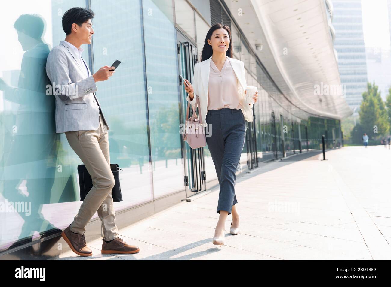 Chinese office lady walk hi-res stock photography and images - Alamy