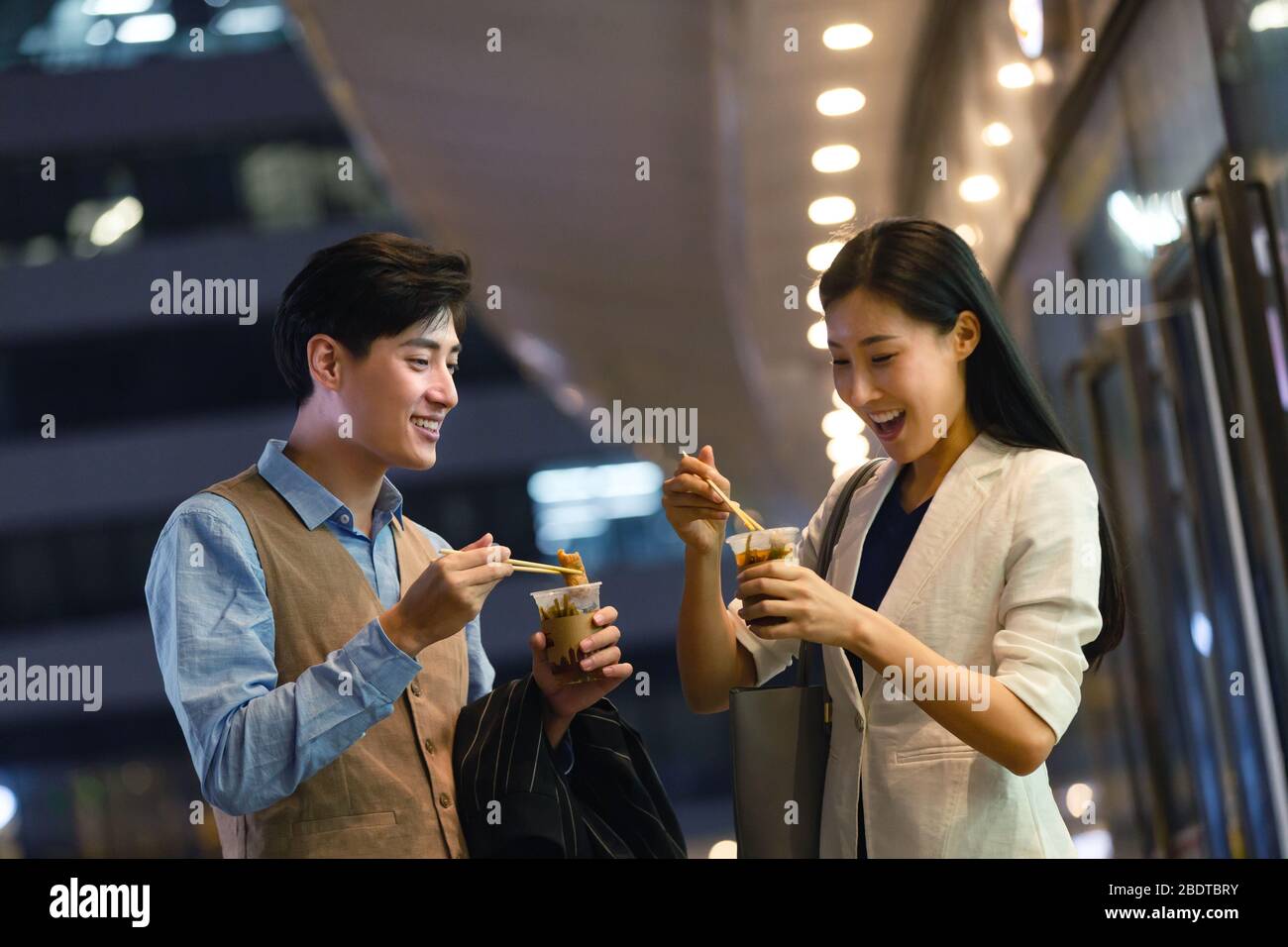 Business people eating in the open air Stock Photo - Alamy