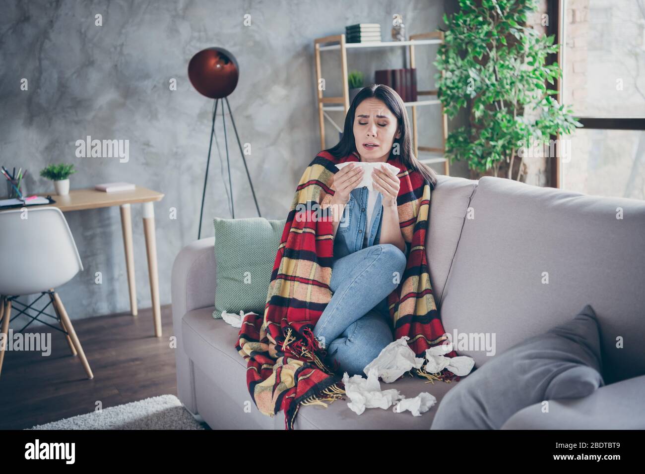 Portrait of her she nice attractive sick brunette girl sitting on divan ...