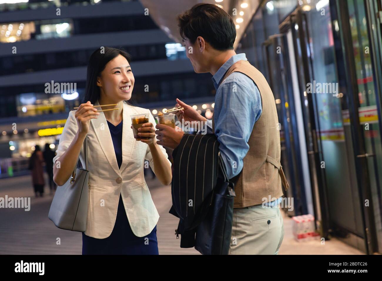Business people eating in the open air Stock Photo - Alamy