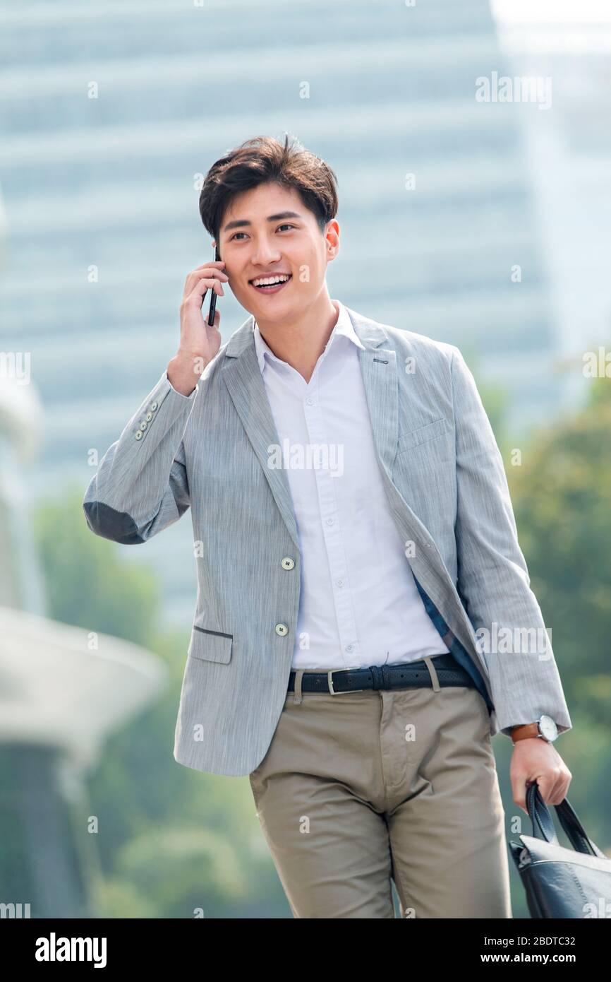 Business man make a phone call Stock Photo - Alamy