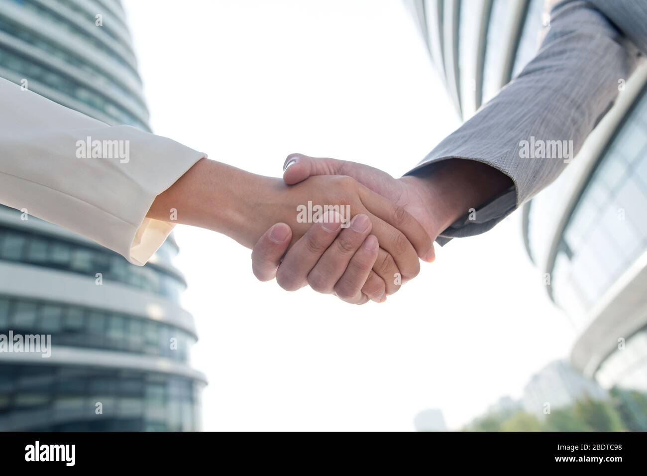 Business people shake hands Stock Photo - Alamy