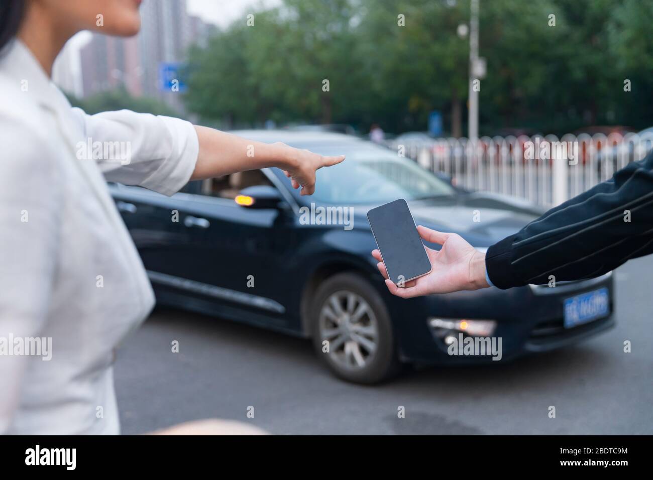 Person wait taxi hi-res stock photography and images - Alamy