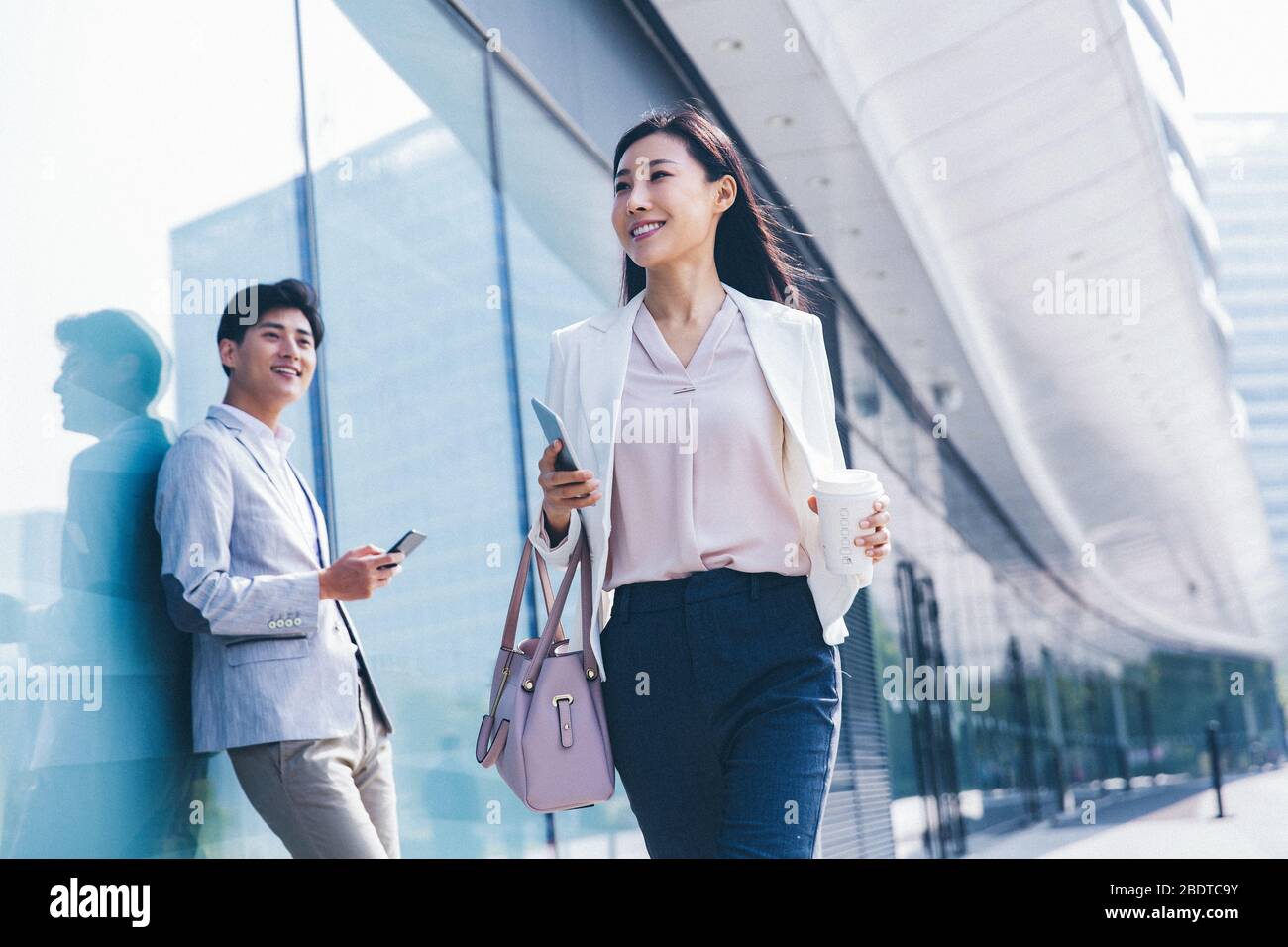 Chinese office lady walk hi-res stock photography and images - Alamy