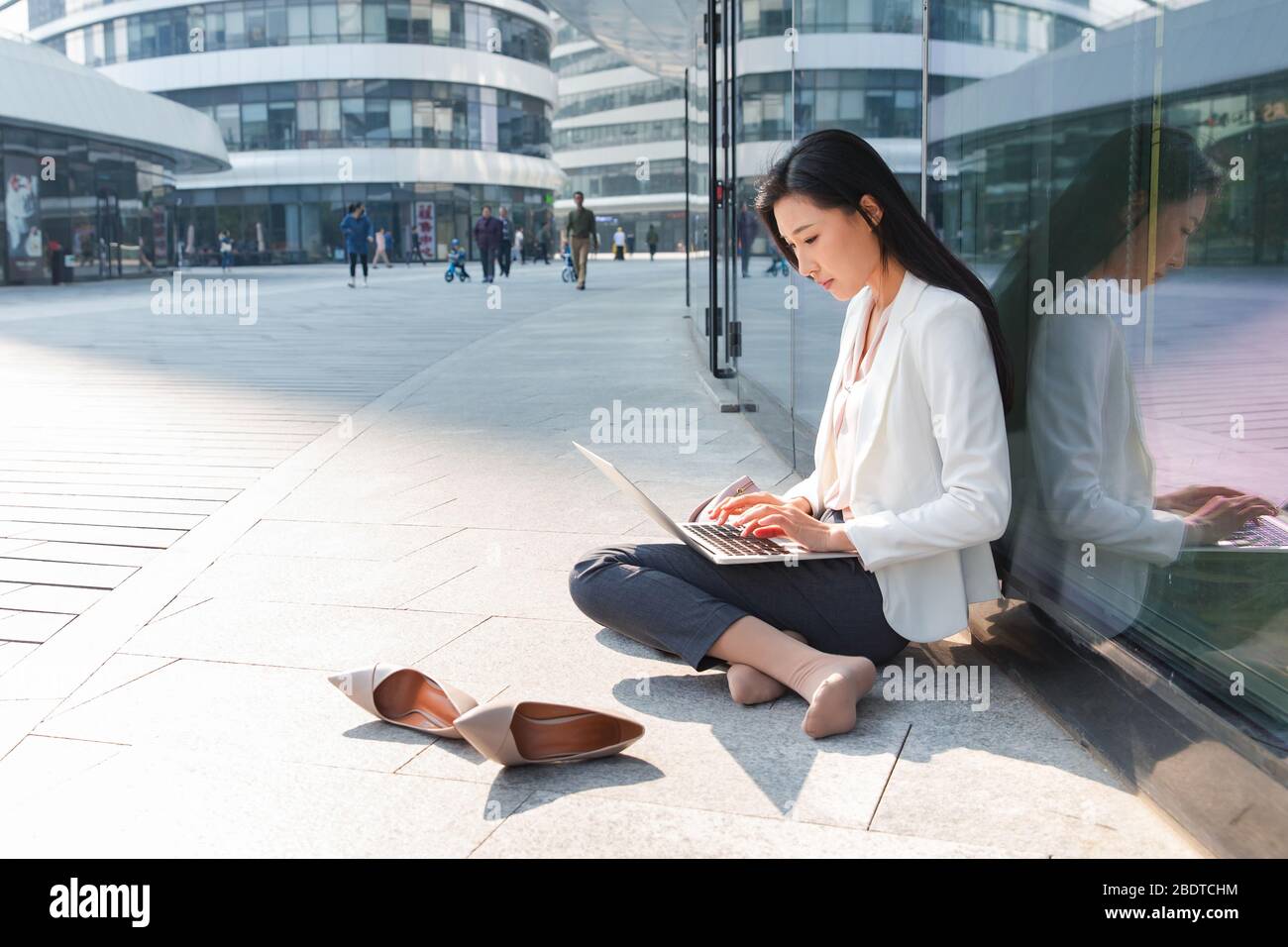 Asian businesswoman on ground hi-res stock photography and images - Alamy