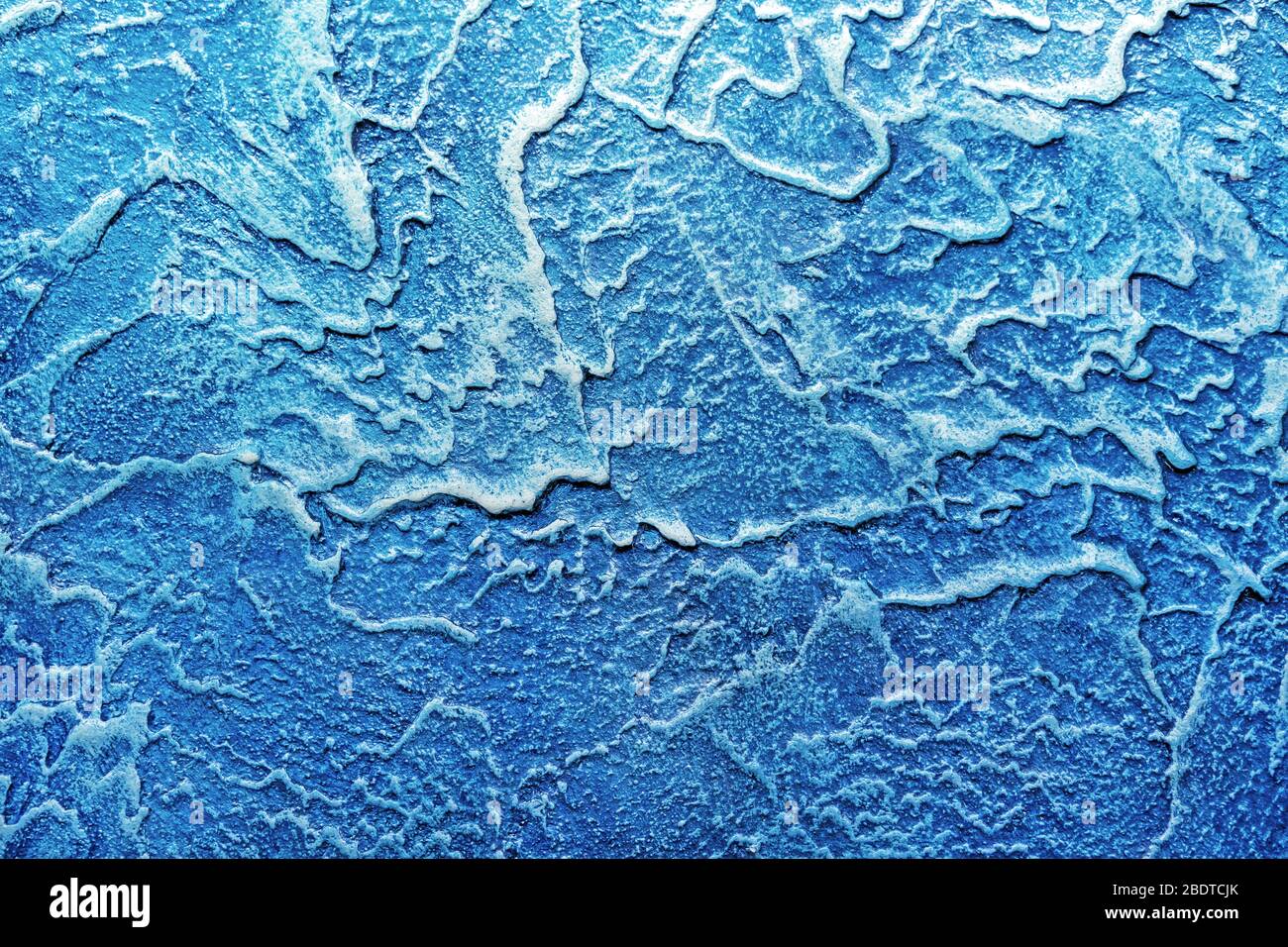 Venetian stucco of blue color with white stains. Background and texture ...