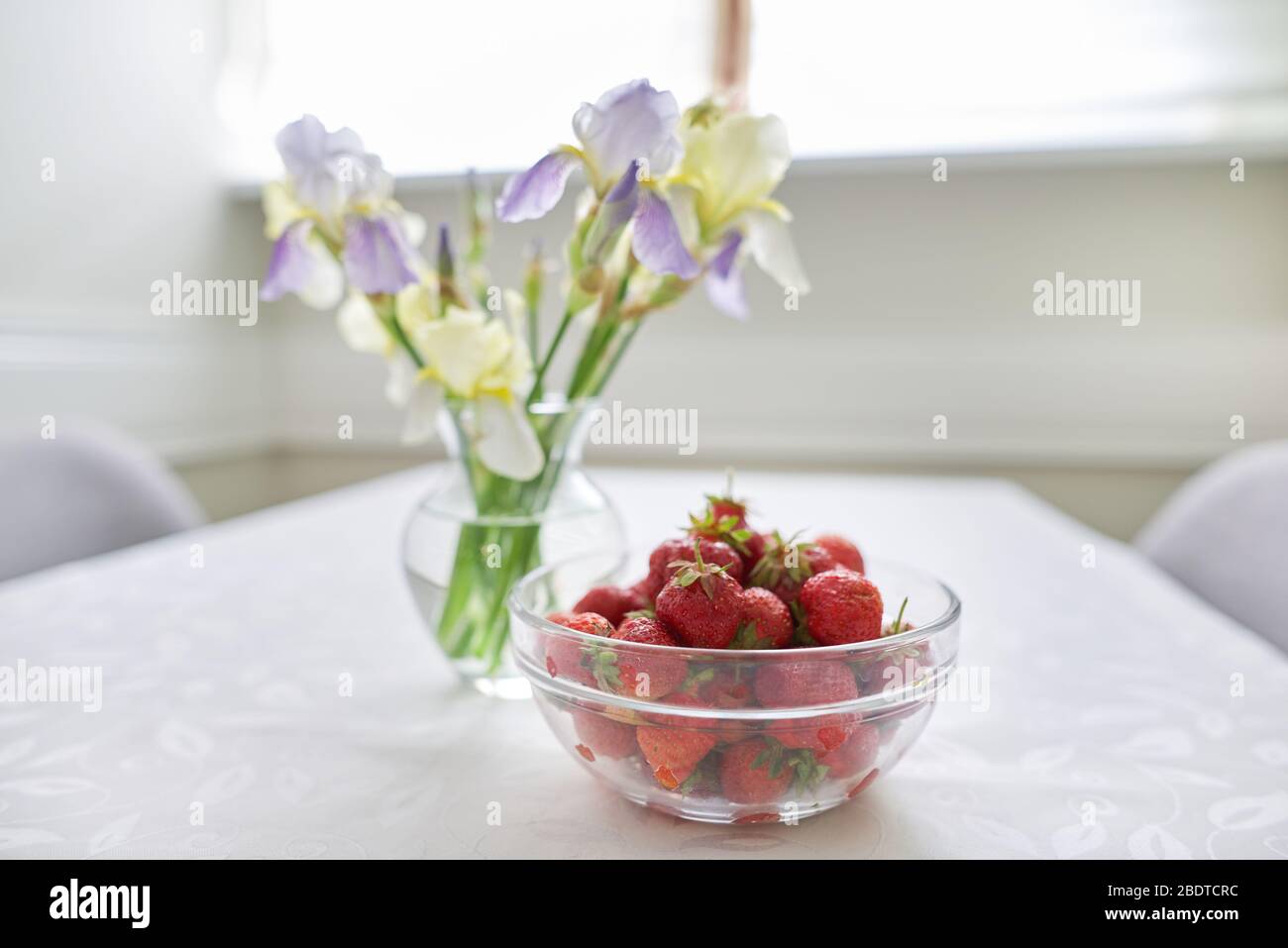Home dining room interior, table with white tablecloth, spring summer ...