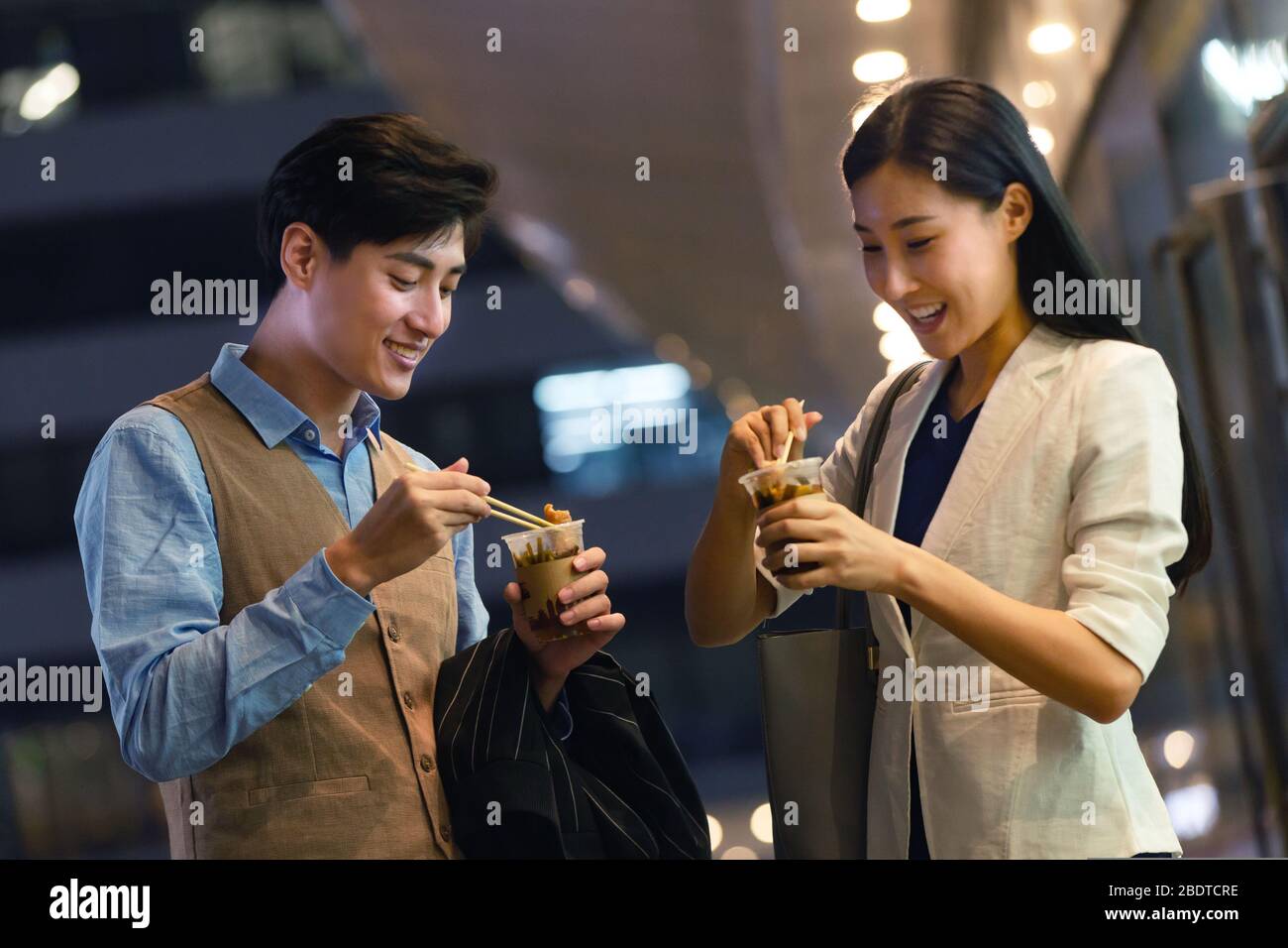 Business people eating in the open air Stock Photo - Alamy