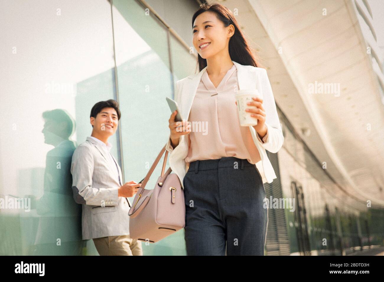 Chinese office lady walk hi-res stock photography and images - Alamy