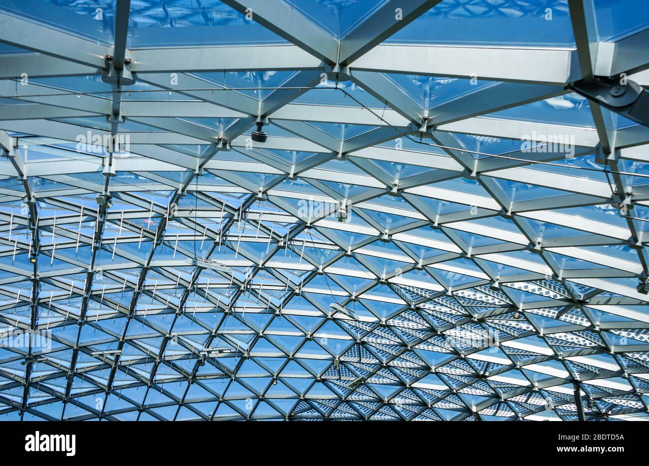 Glass roofing dome in the shape of numerous triangles Stock Photo - Alamy