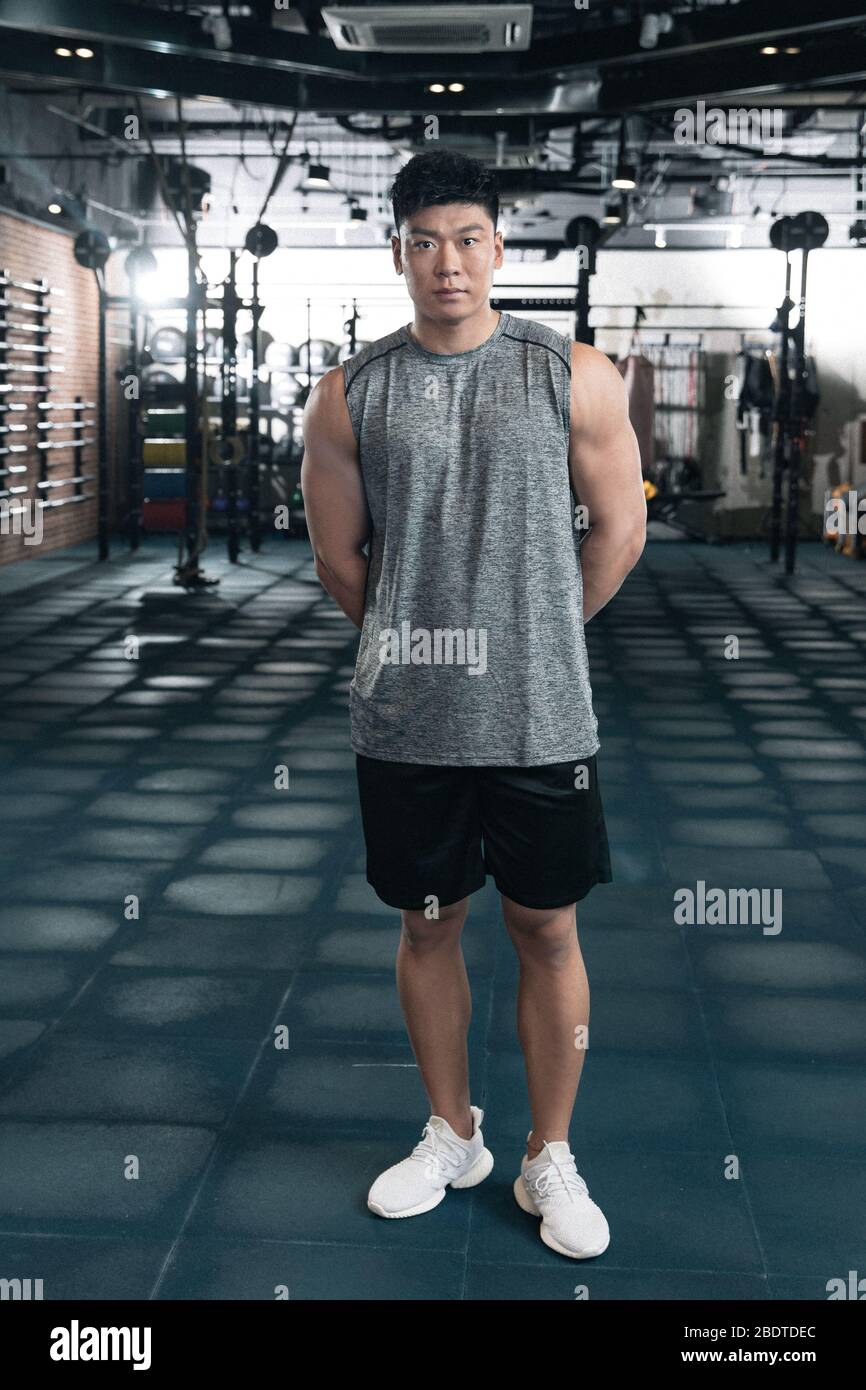 Young men in the gym Stock Photo - Alamy