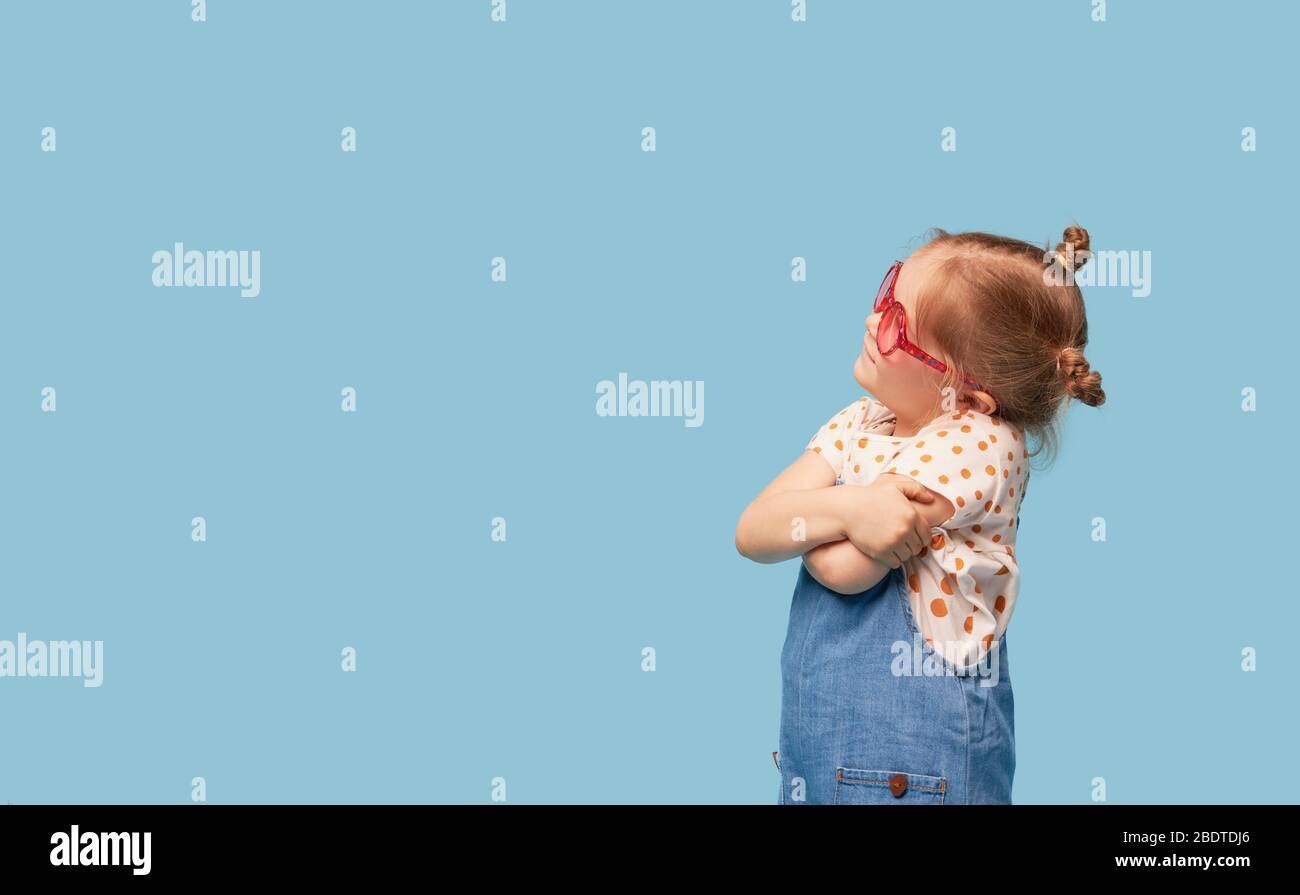 Portrait of surprised cute little toddler girl child standing isolated ...