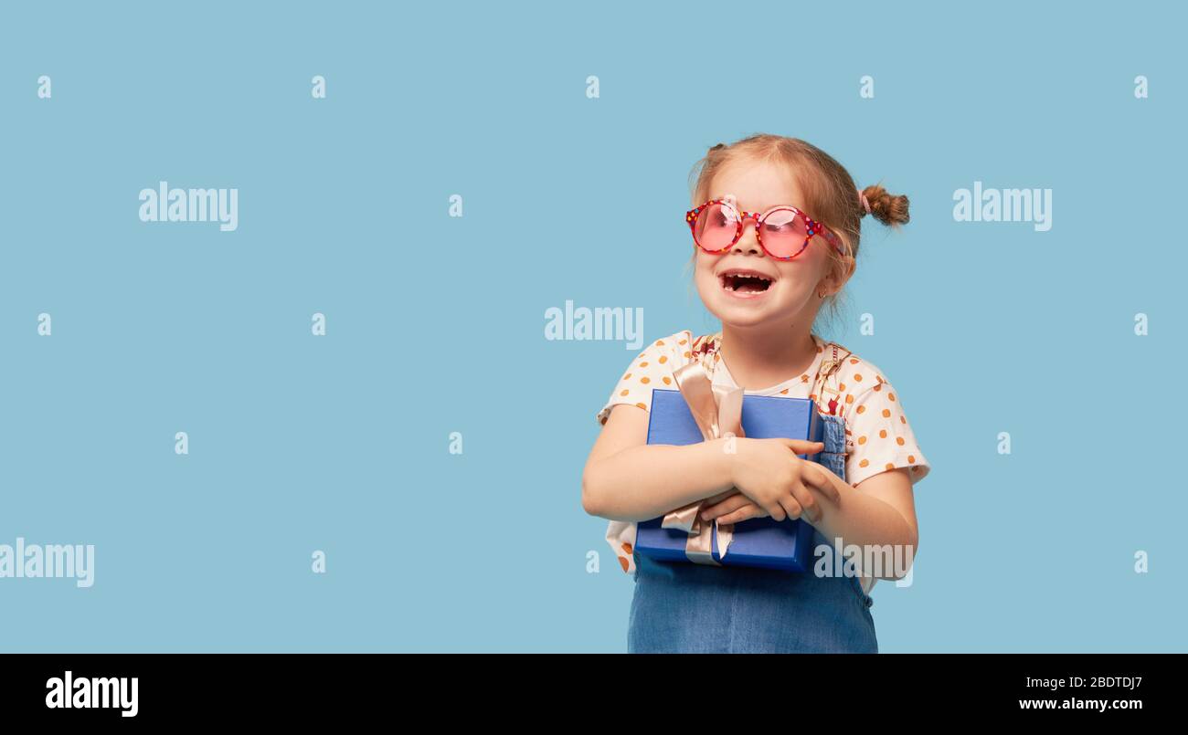 Portrait of surprised cute little toddler girl child standing isolated ...