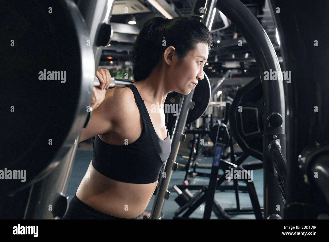 Women lift up hi-res stock photography and images - Alamy