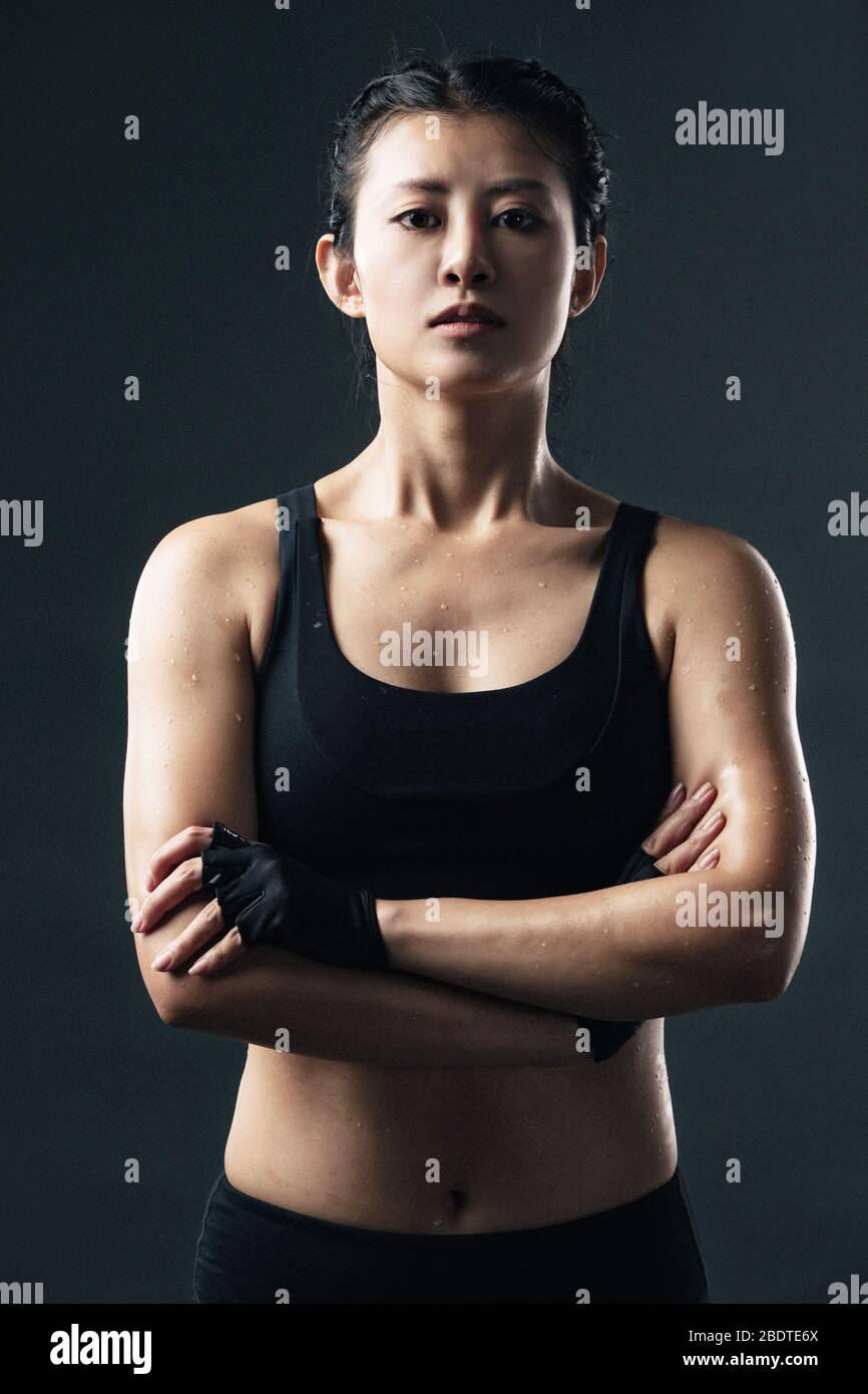 The portrait of young female fitness coach Stock Photo - Alamy