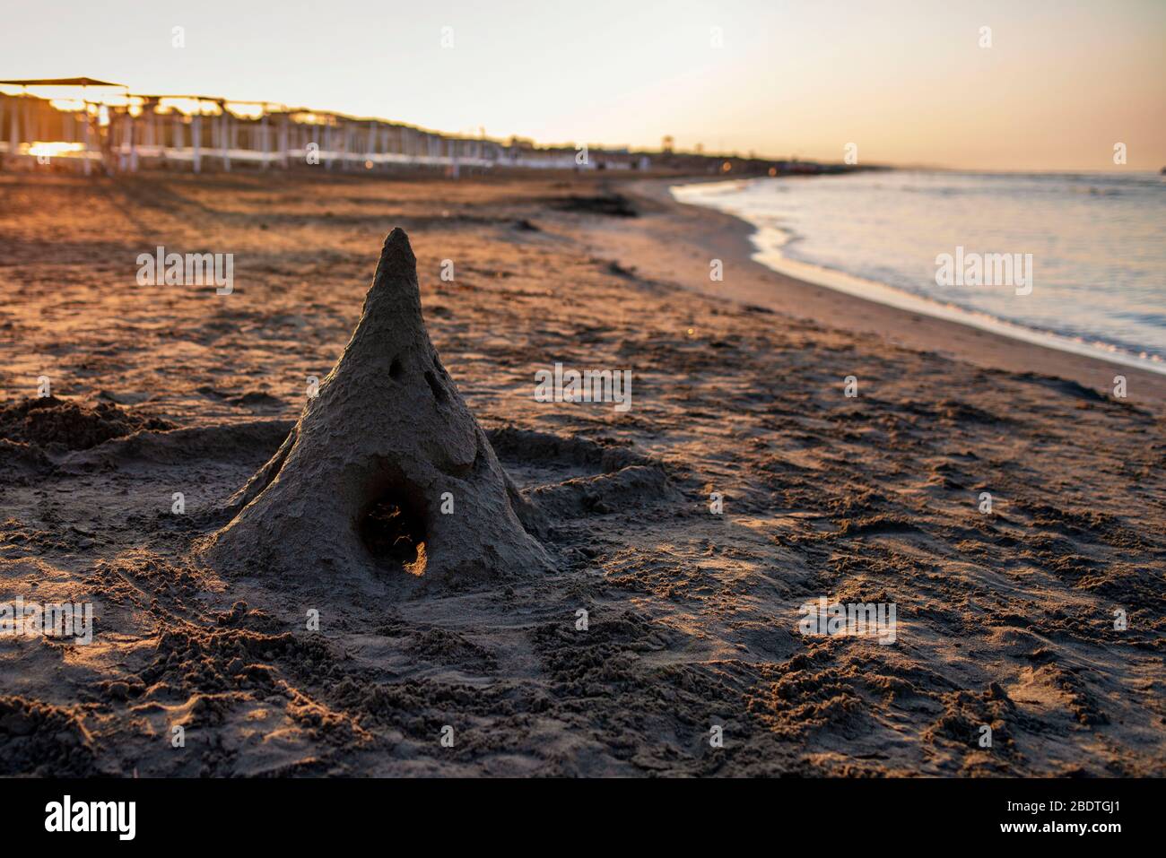Sand figure on the beach Stock Photo - Alamy