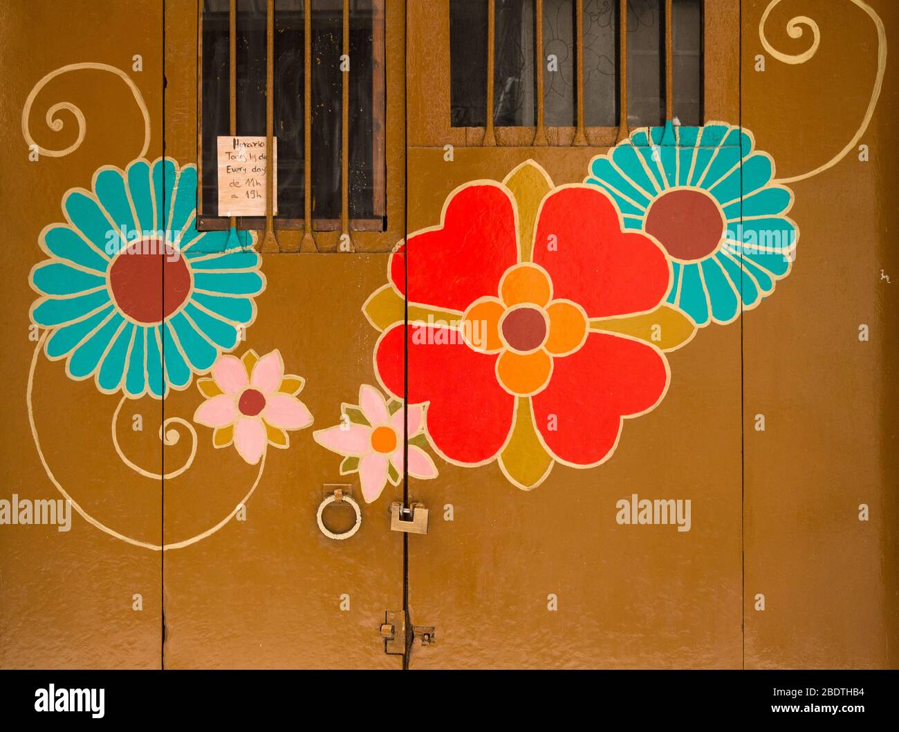 Painted door with flower pattern Stock Photo - Alamy
