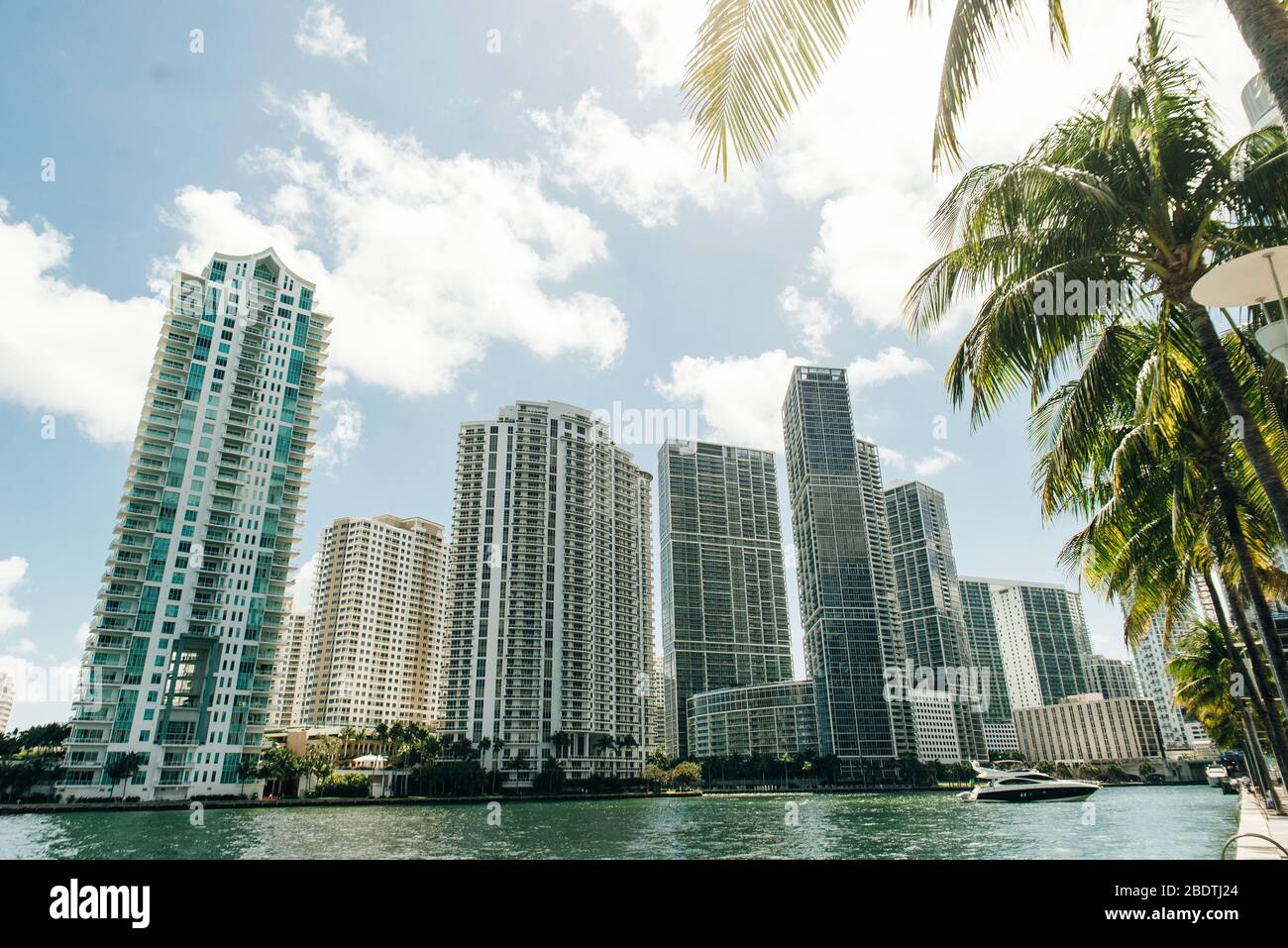 Downtown Miami along the Miami River inlet with Brickell Key in the ...