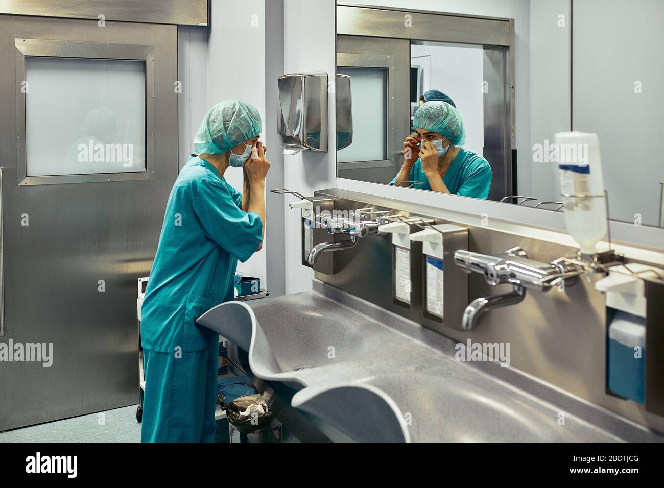 The doctor washes his hands before surgery. Sterility concept. A ...