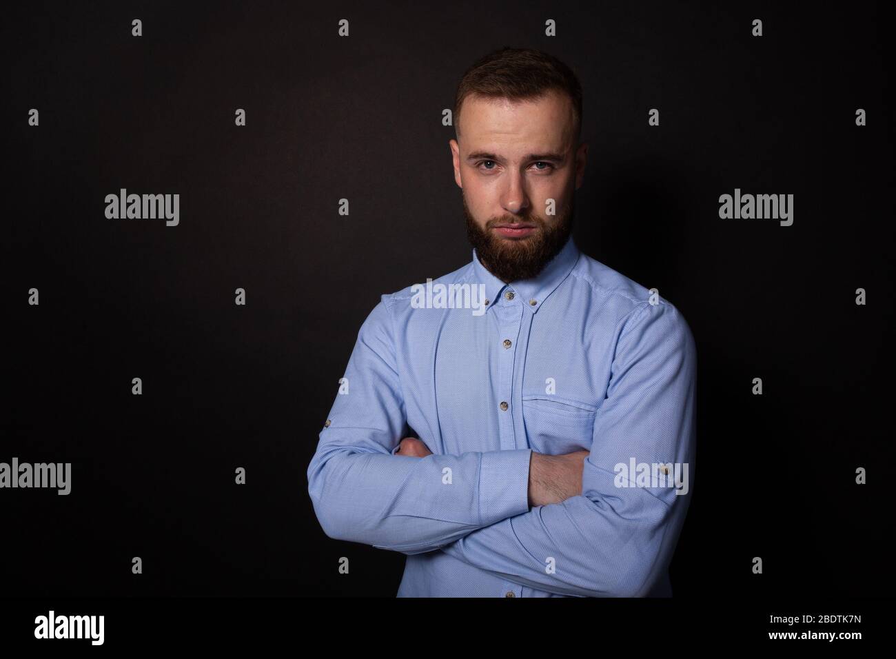 Handsomeman looking seriously and confidently at camera. Business ...