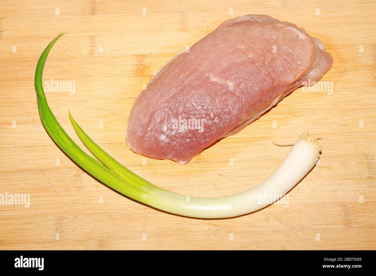 lean meat and the ingredients on the chopping board Stock Photo - Alamy