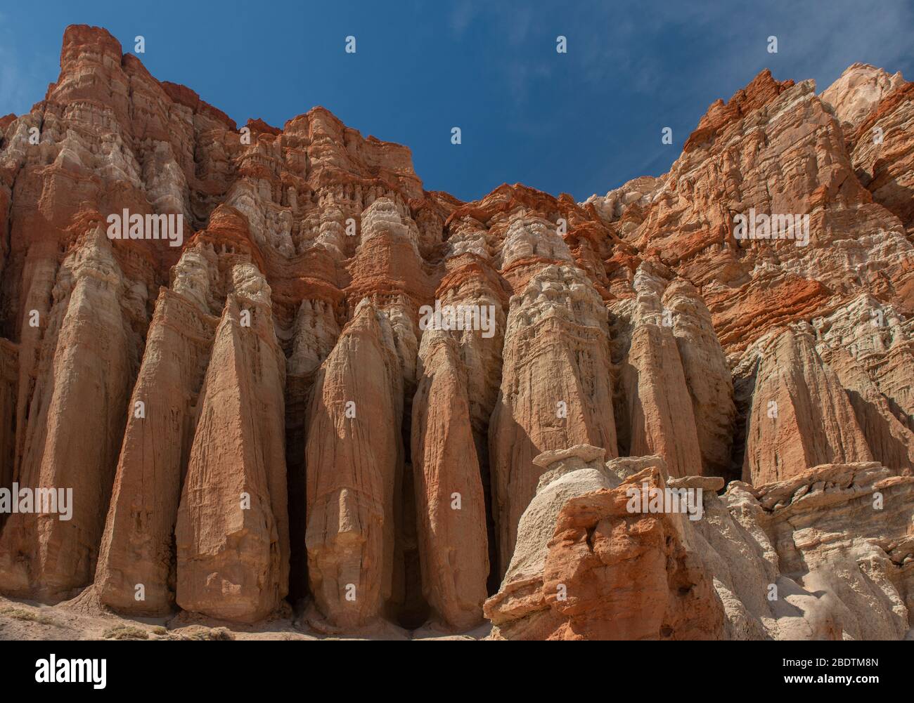 Red Rocks Towering Canyon Wall in Desert Landscape Stock Photo - Alamy