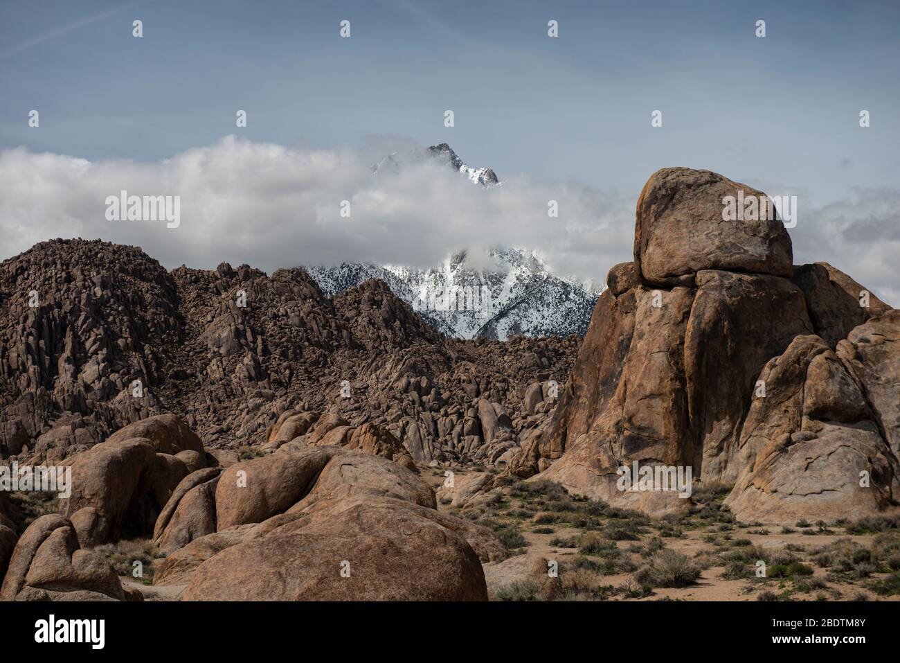 Desert Boulders in the Alabama Hills in front of contiguous Amer Stock ...