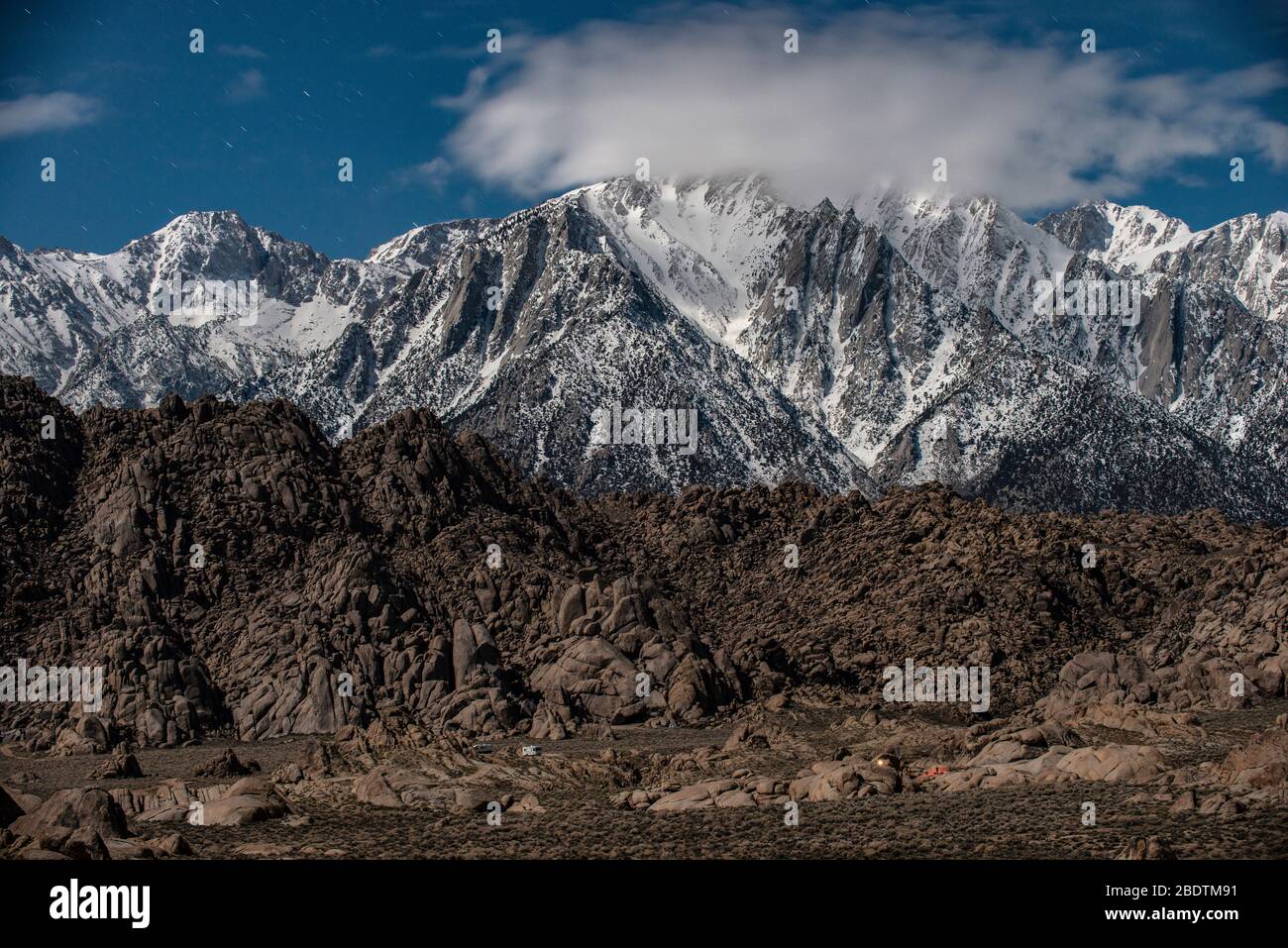 Desert Boulders in the Alabama Hills in front of contiguous Amer Stock ...