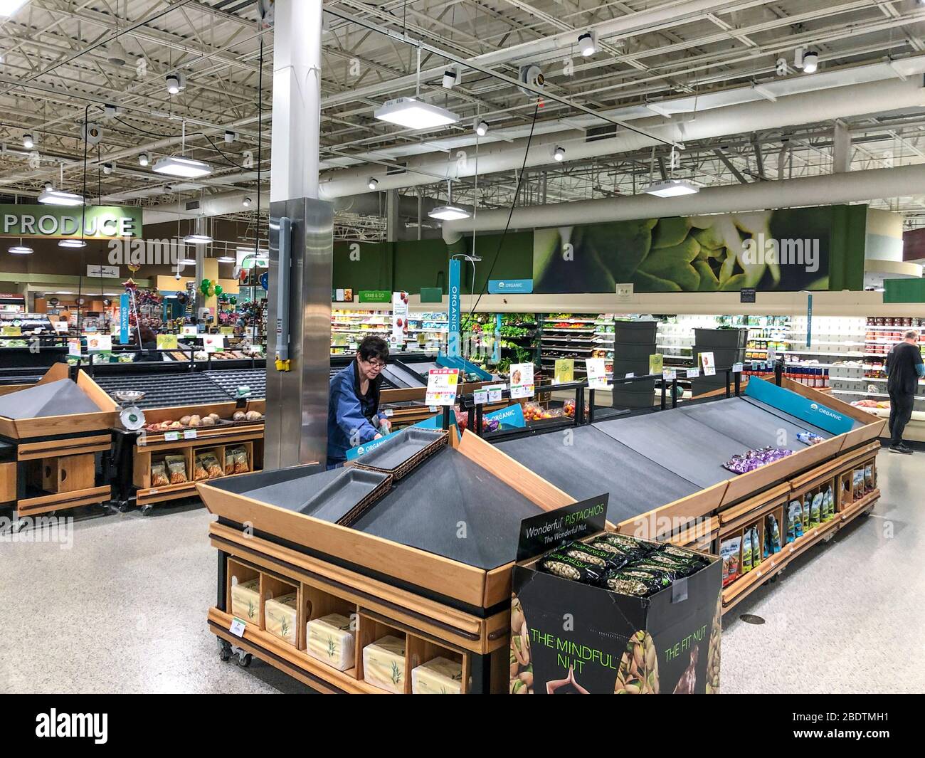 Empty food shelves in a grocery store Stock Photo - Alamy