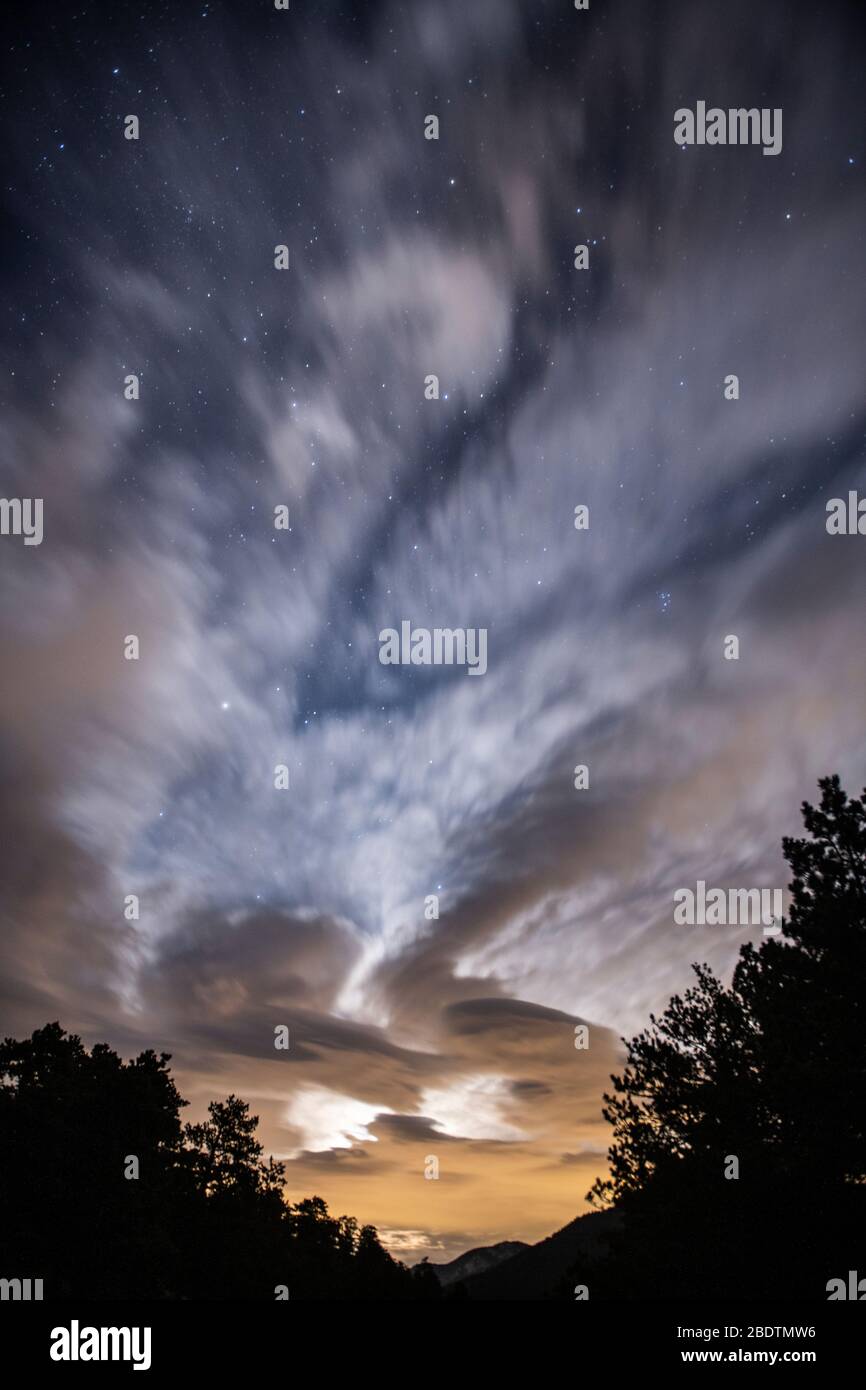 Colorful Night and Fast Moving Clouds Long Exposure Stock Photo - Alamy